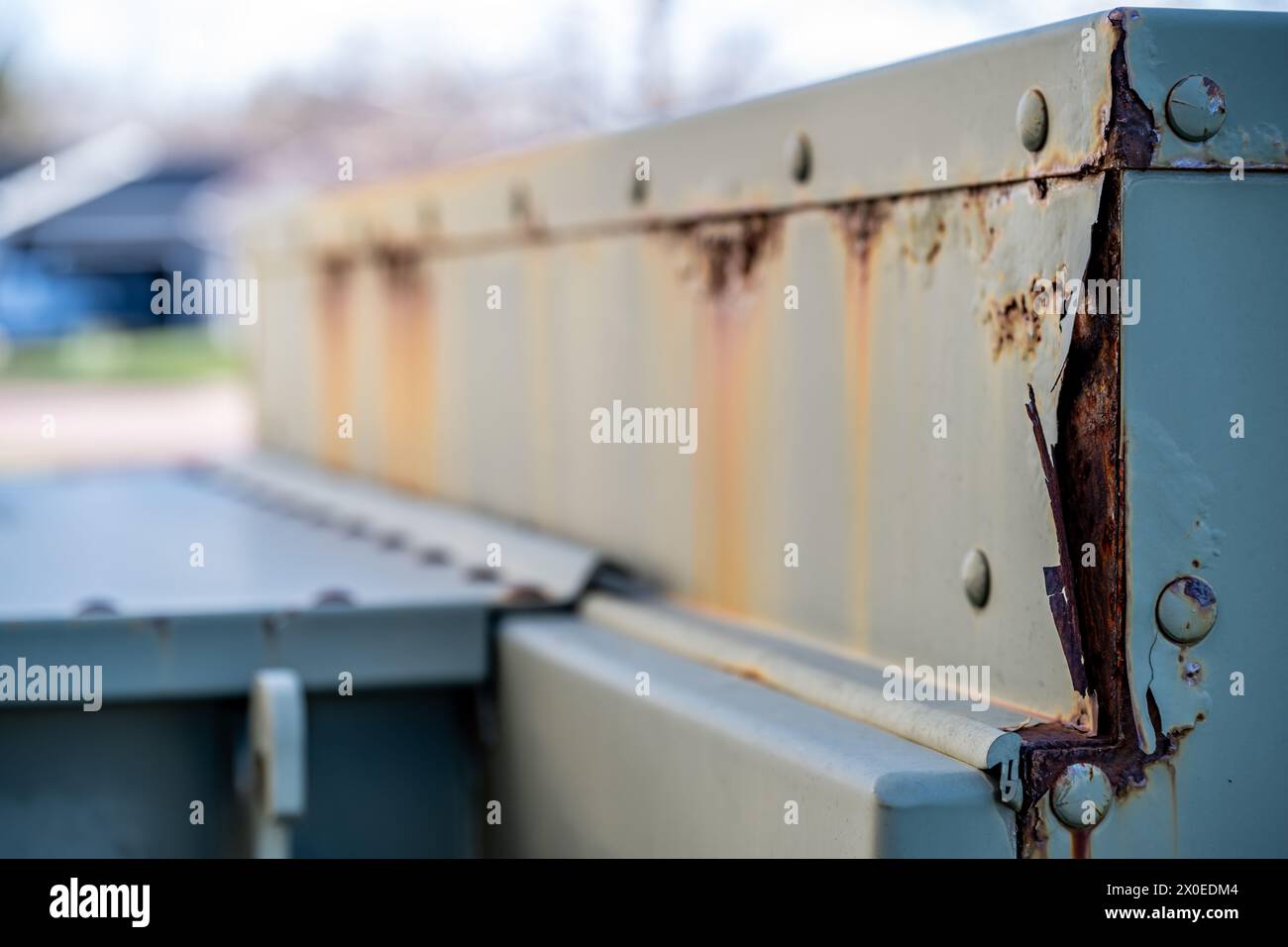 Rusted and peeling paint on an electrical transformer exposed to the ...