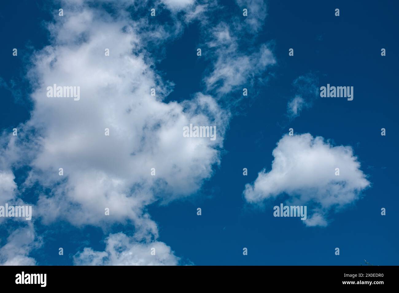 Image of a blue sky with clouds Stock Photo - Alamy