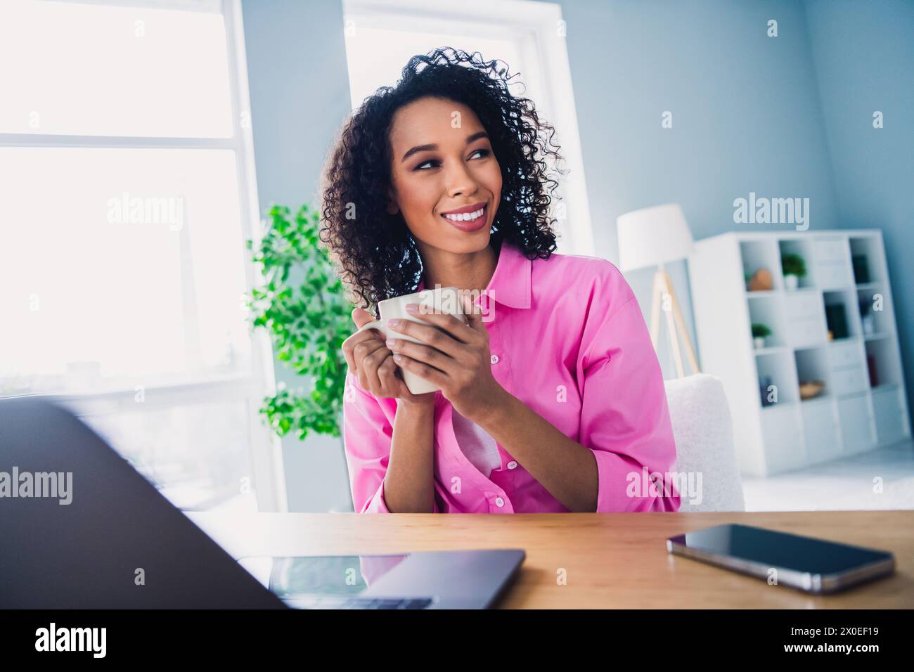 Photo of pretty young girl work drink coffee work netbook entrepreneur ...