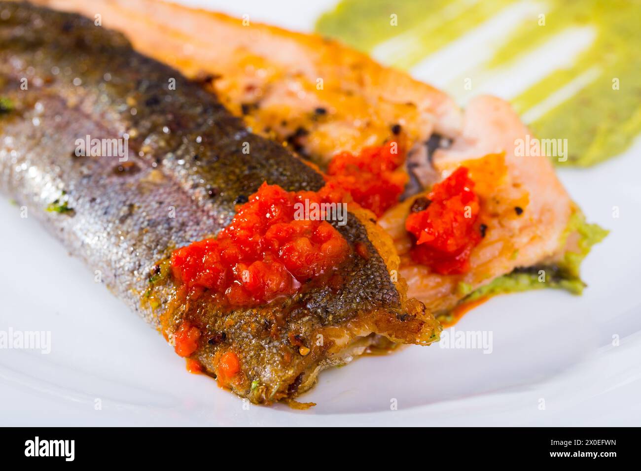 Roasted trout fillet with sauces Stock Photo - Alamy