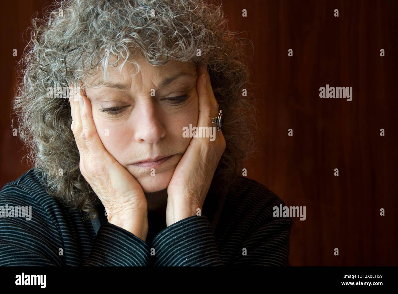 Hands cupping woman face hi-res stock photography and images - Alamy