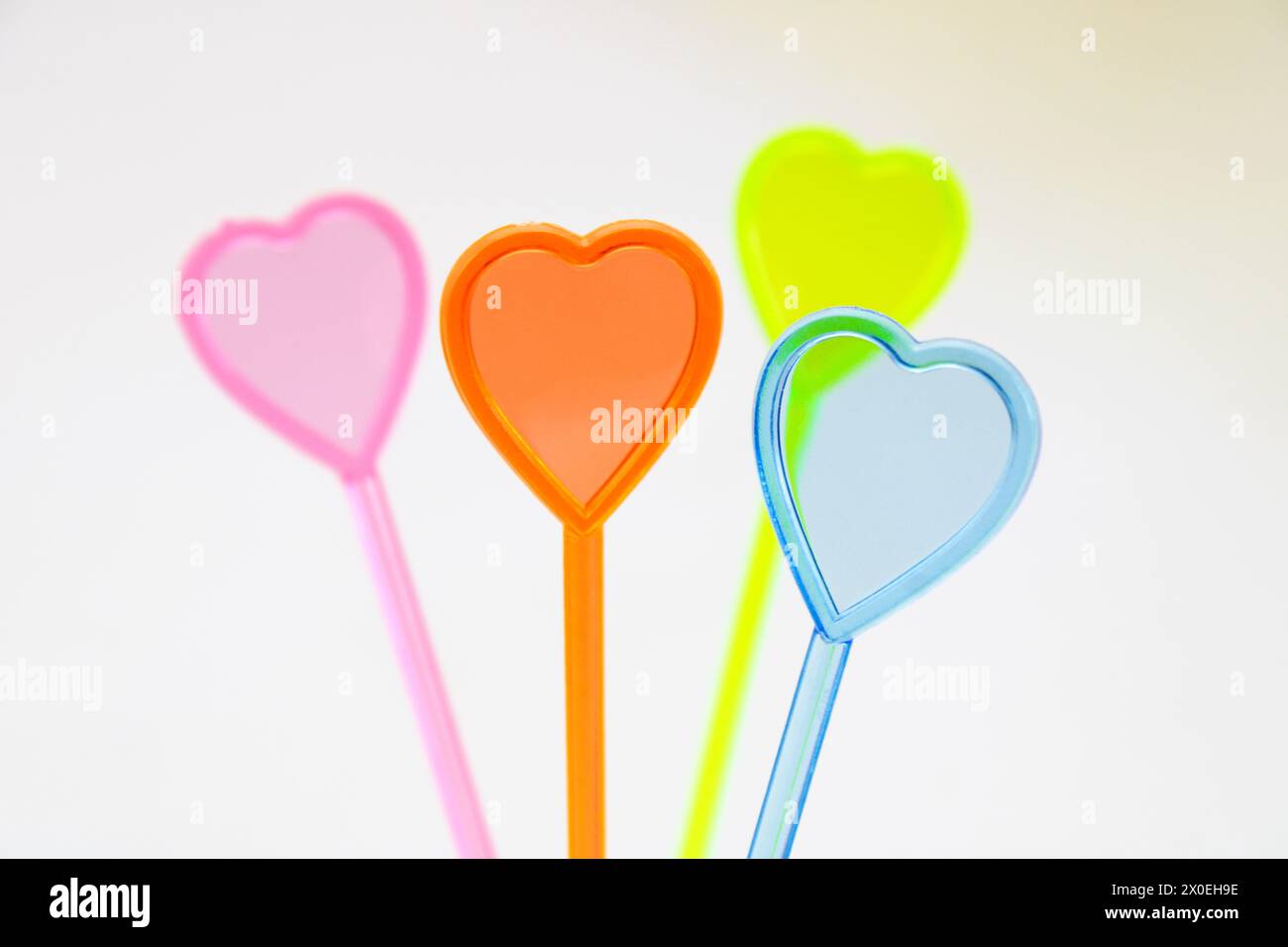 Four hearts of different colors with transparency Stock Photo - Alamy