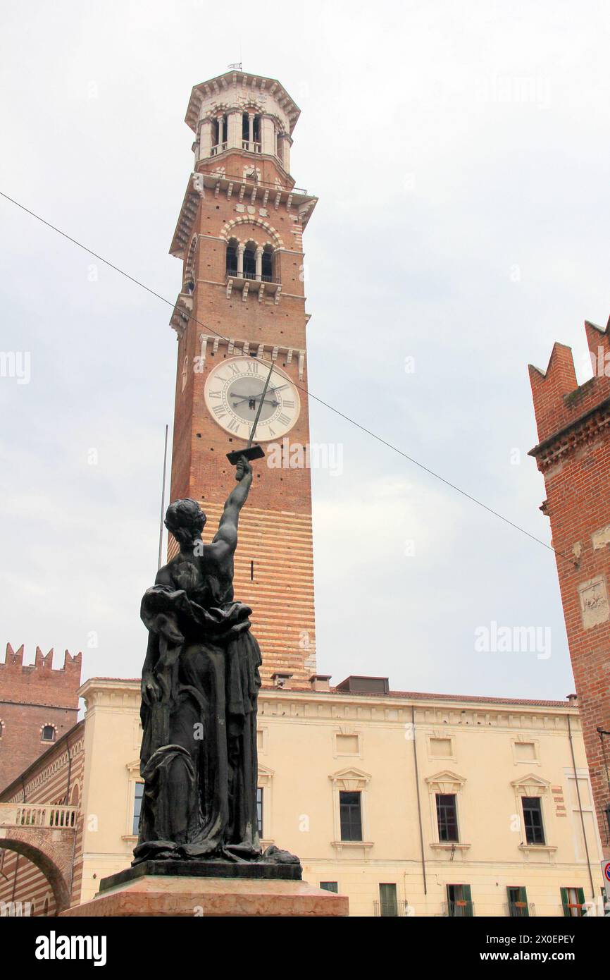 Statue Civilta Italica, at the Piazza Erbe, and the Torre dei Lamberti ...