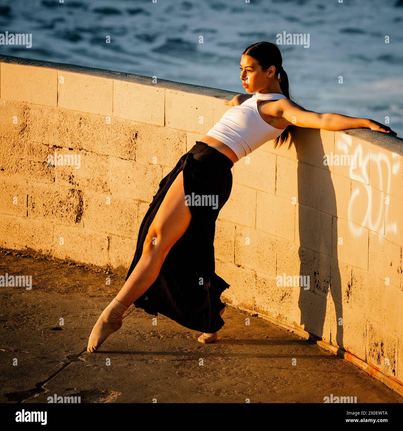 Asian Teenage Female Dancing on Shoreline Cliffs at Lands End in San ...