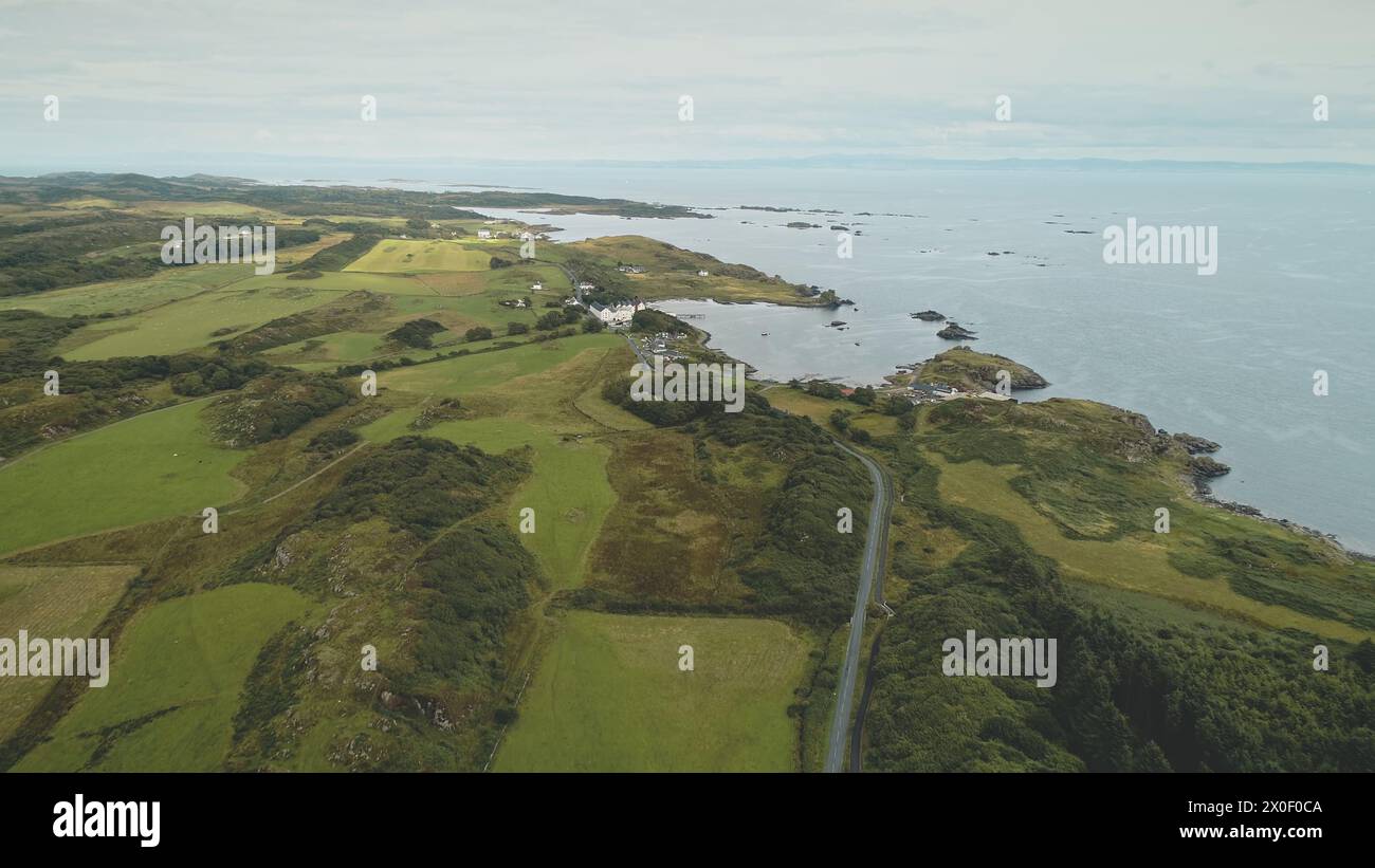 Alcohol industy at sea bay aerial. Whiskey distillery at countryside ...