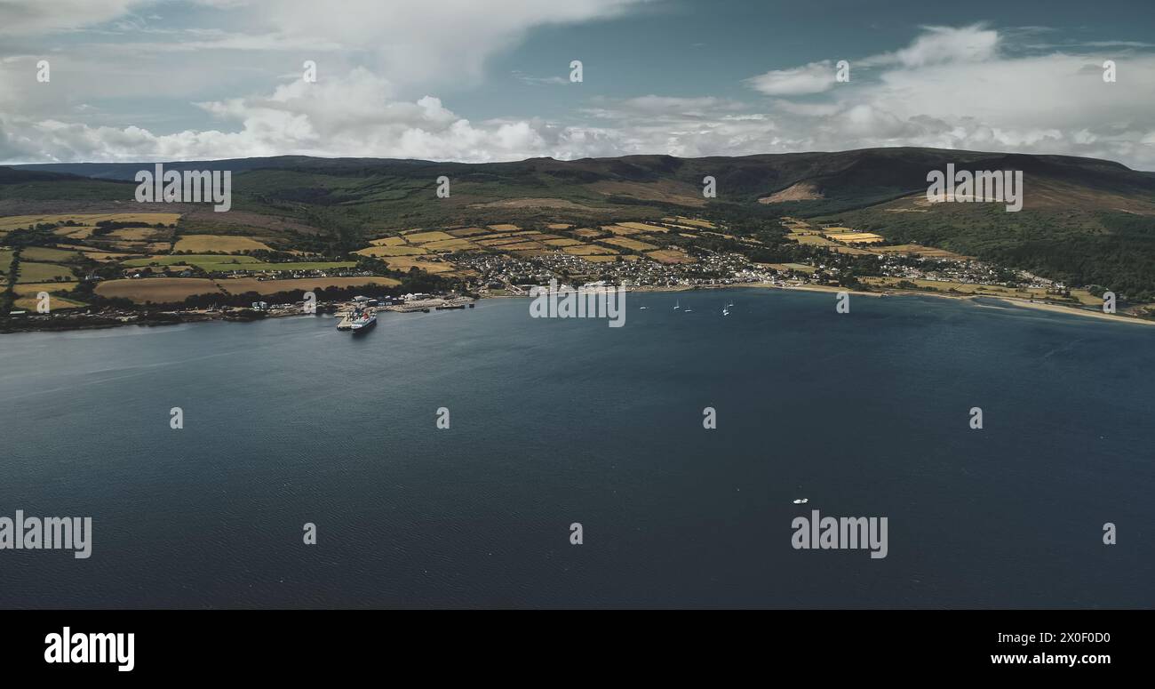 Brodick ocean ferry pier aerial view: ships, boats and sailboat on ...