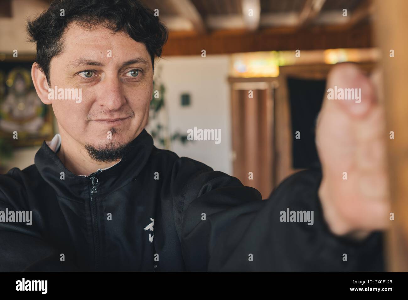 A Kung Fu practitioner focuses on perfecting the Jik Kuen technique ...
