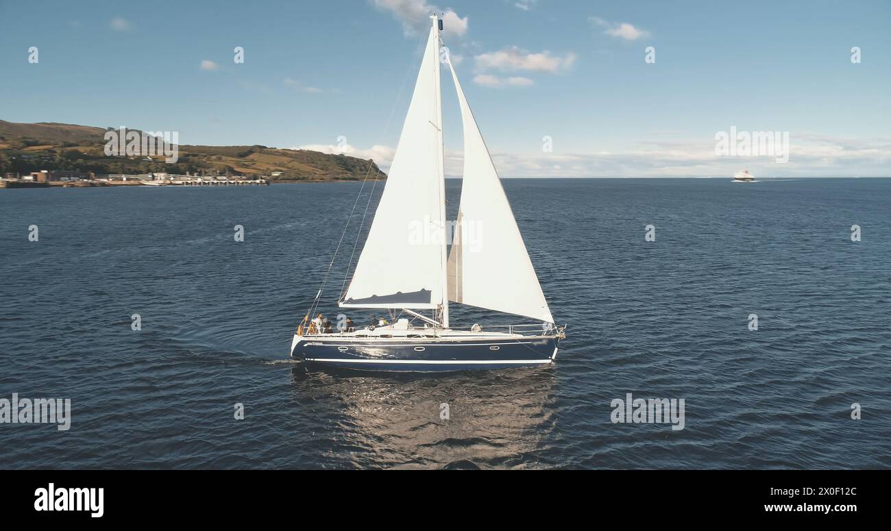 Luxury yacht at open sea racing under sails aerial. Amazing seascape of ...