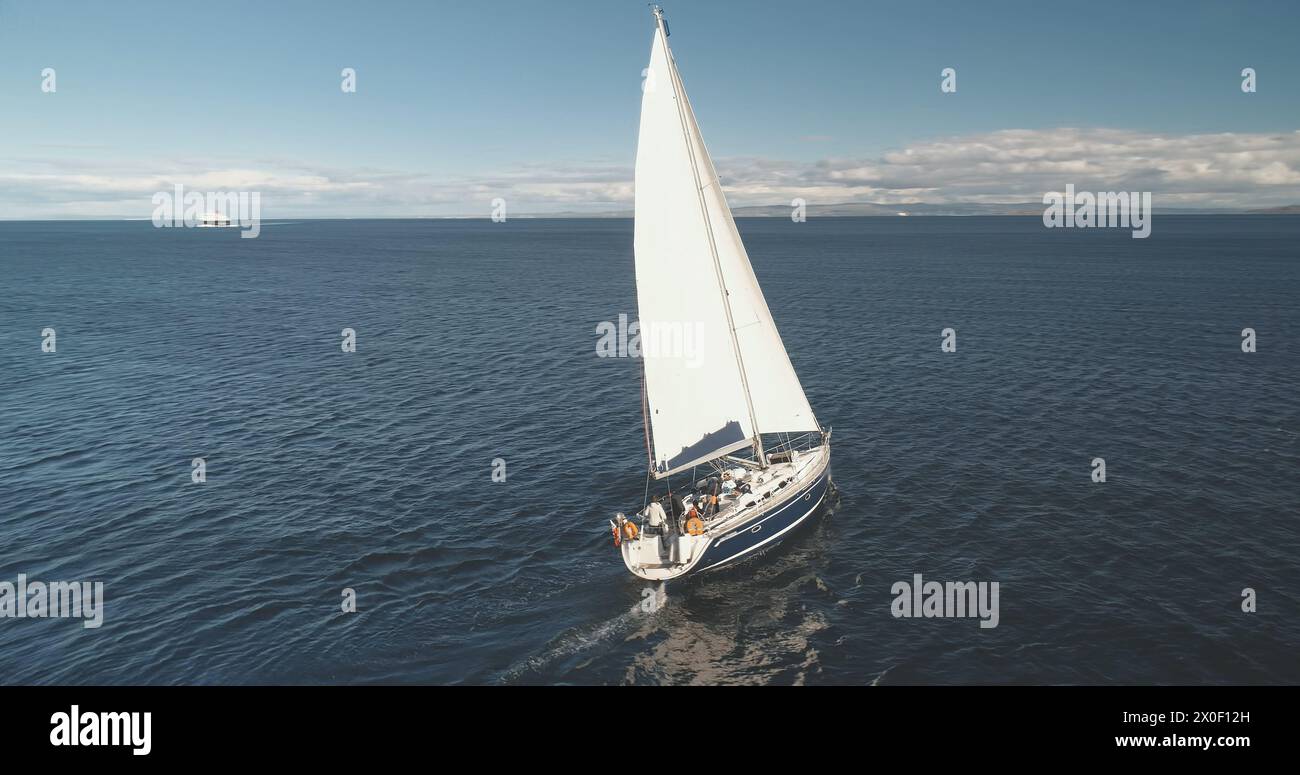 Luxury yacht at open sea racing under sails aerial. Amazing seascape of ...