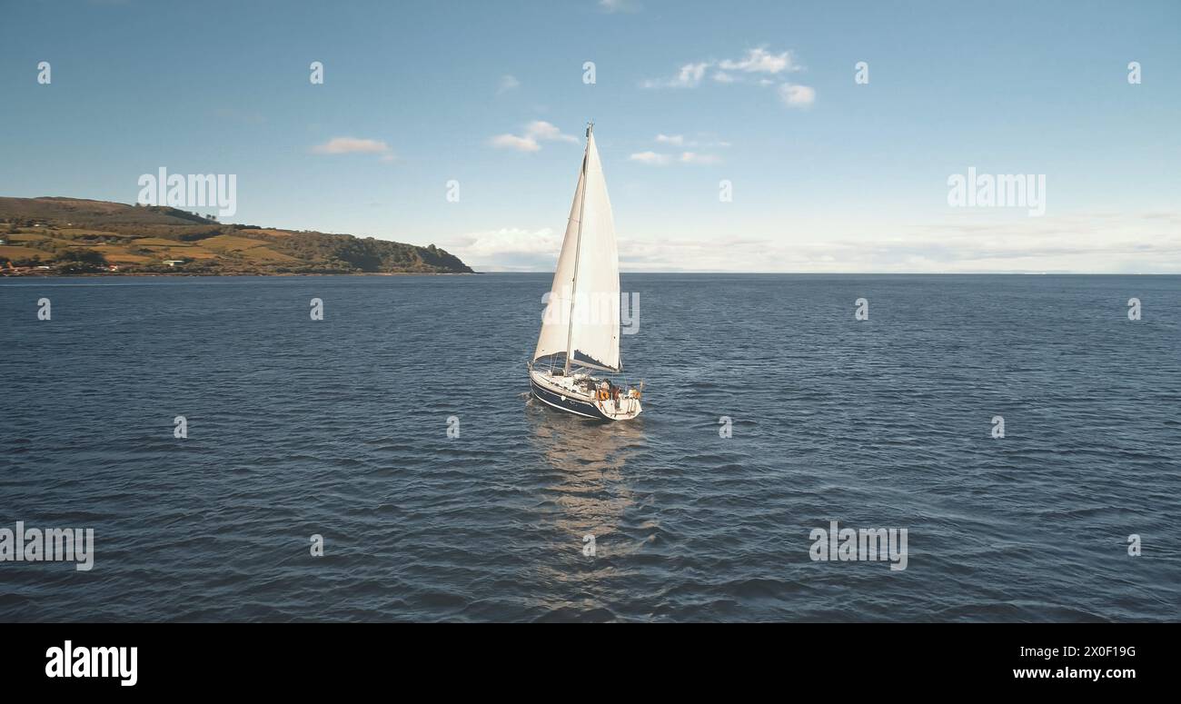 Slow motion of yacht reflection at sea gulf aerial. Alone sail boat ...