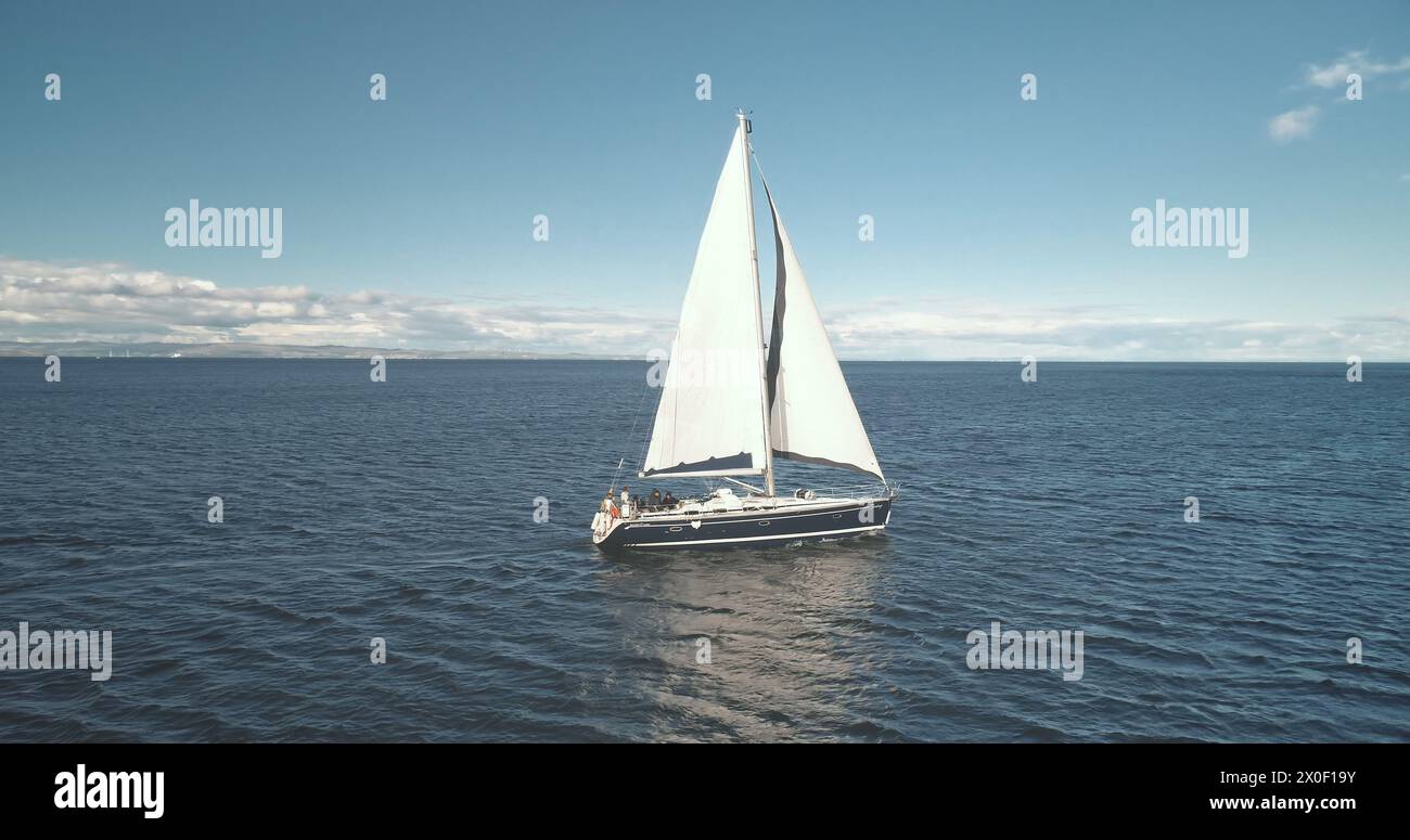 Slow motion of yacht reflection at sea gulf aerial. Alone sail boat ...