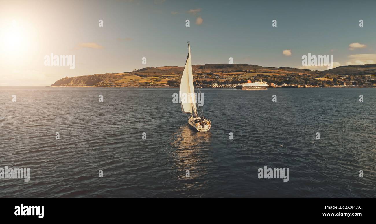 Slow motion of sun ocean gulf with yacht sailing aerial. Sunlight ...