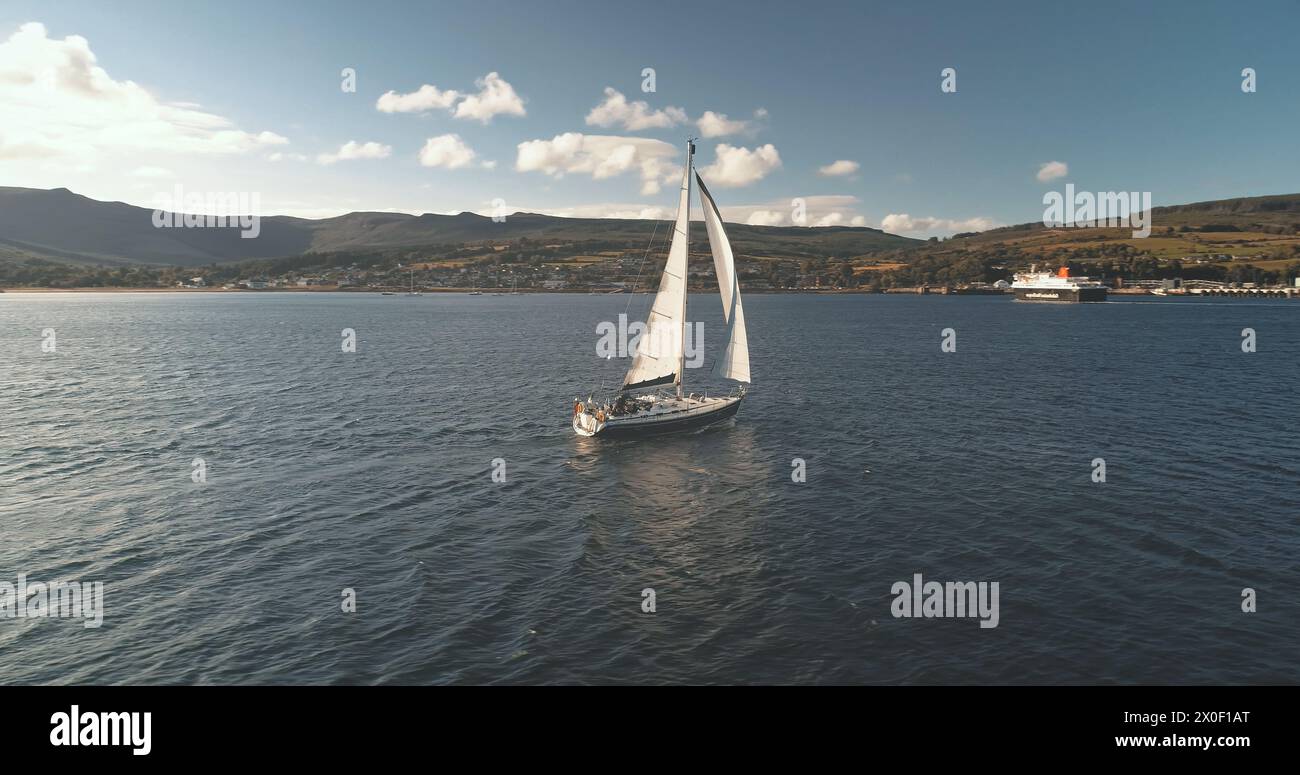 Slow motion of sun ocean gulf with yacht sailing aerial. Sunlight ...