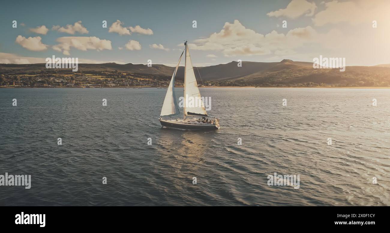 Luxury yacht race at sun light aerial. Yachting on serene seascape at ...