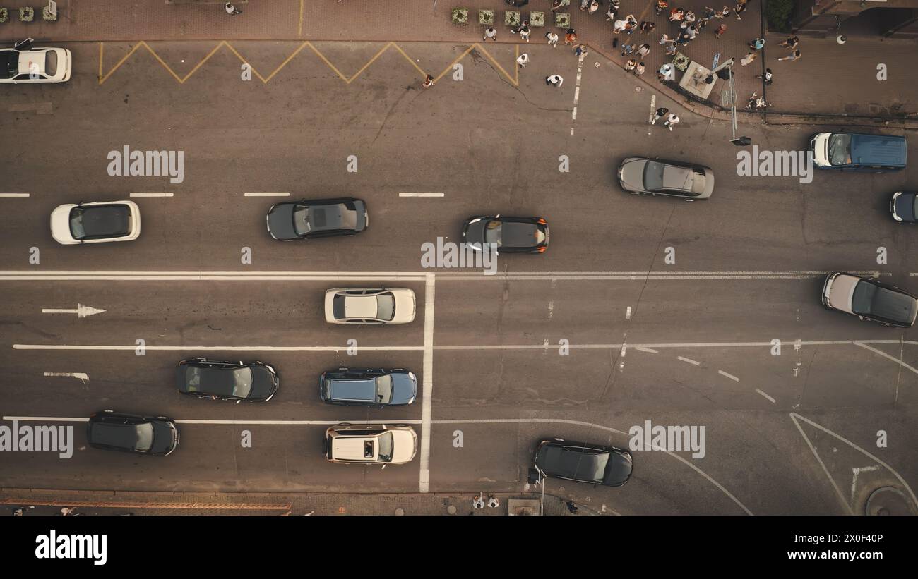 Top down pedestrians crosswalk road aerial. People cross street ...