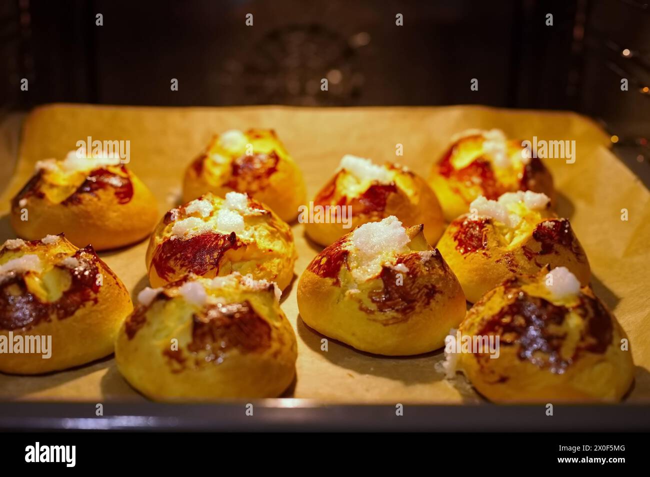 Group of delicious buns baking in oven Stock Photo - Alamy