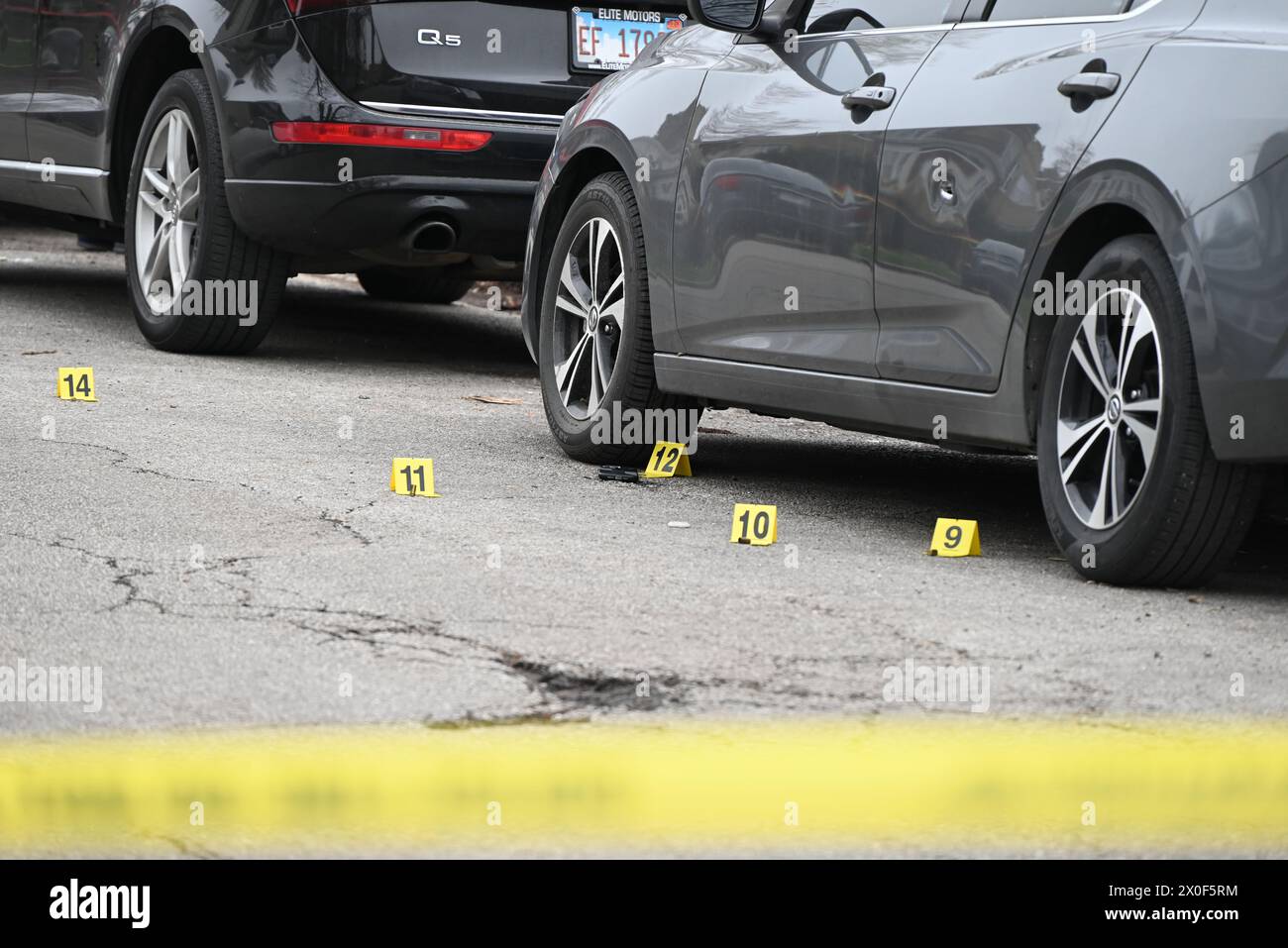 Shell casings discovered at the crime scene and marked by several ...