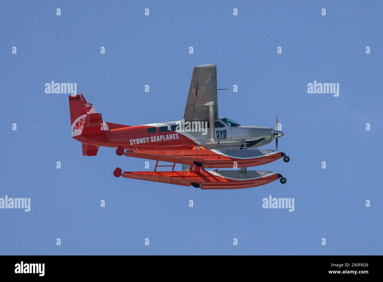 Cessna Caravan Seaplane in flight over Sydney Australia Stock Photo - Alamy