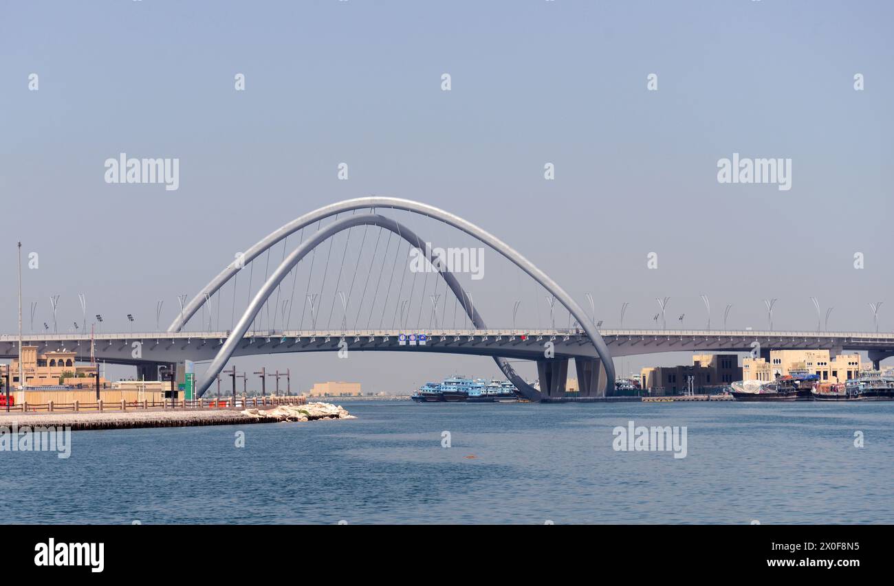 The Infinity Bridge over the Dubai canal in Dubai, UAE Stock Photo - Alamy