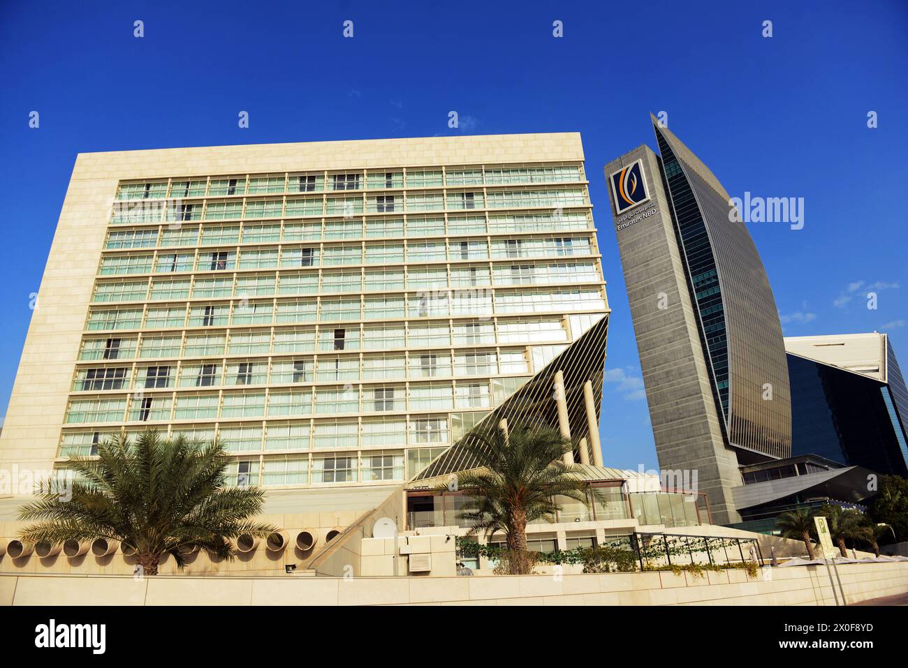 The Sheraton Dubai Creek hotel and the modern Emirates NDB building in ...