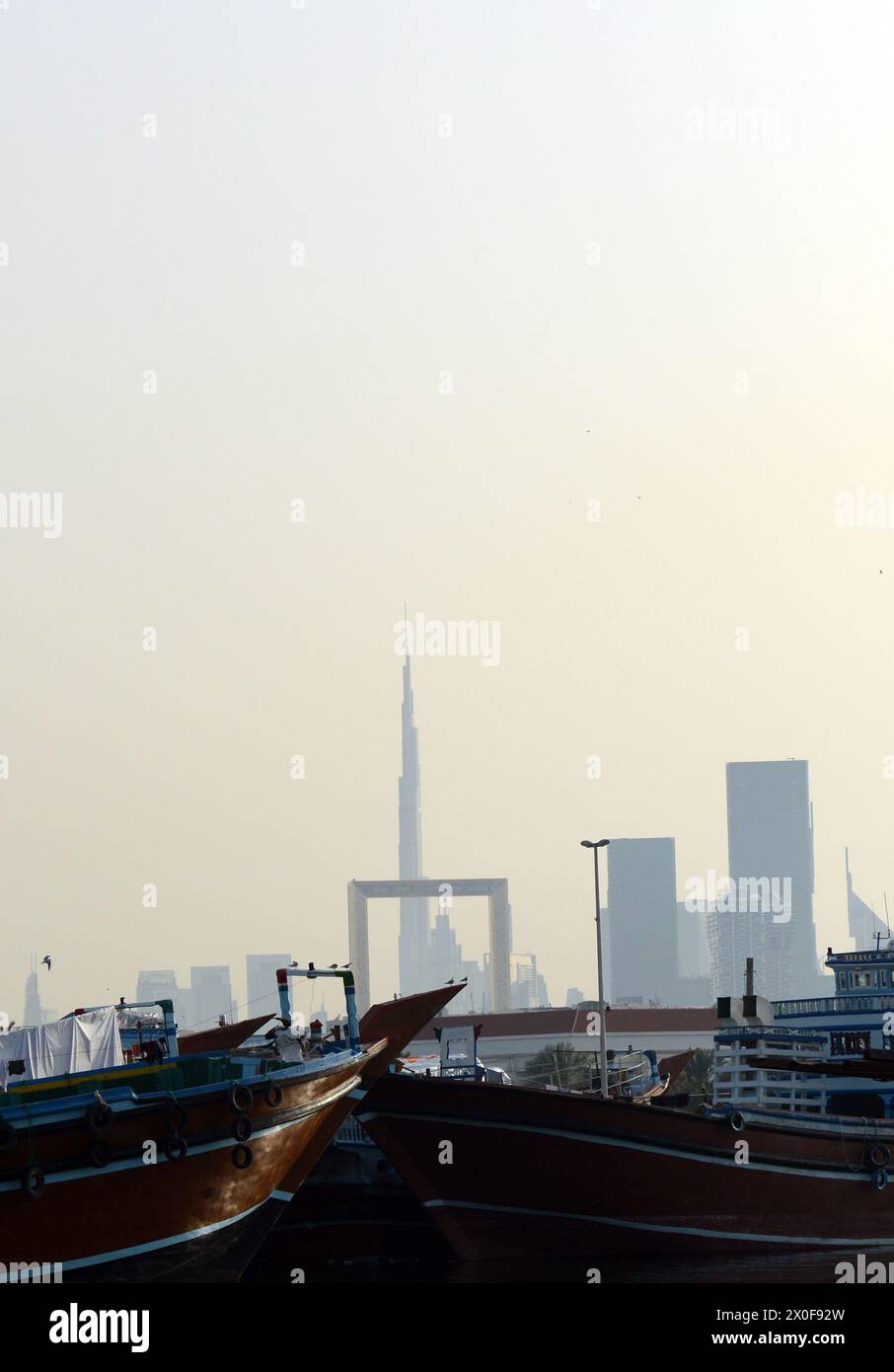 A view of the Dubai Frame and Burj Khalifa tower from Port Saeed in ...