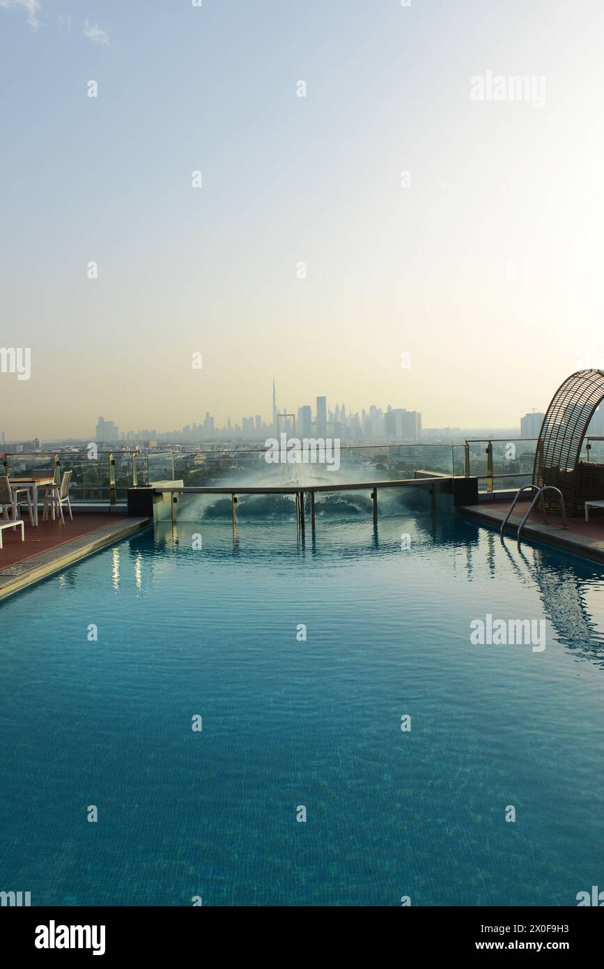A view of the modern skyline of Dubai from the rooftop infinity pool at ...