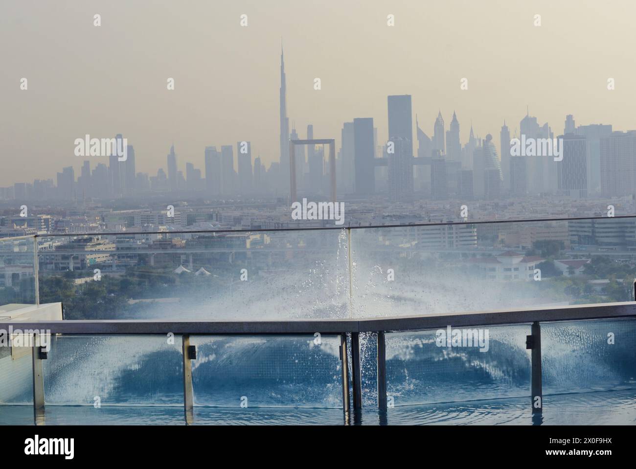 A view of the modern skyline of Dubai from the rooftop infinity pool at ...