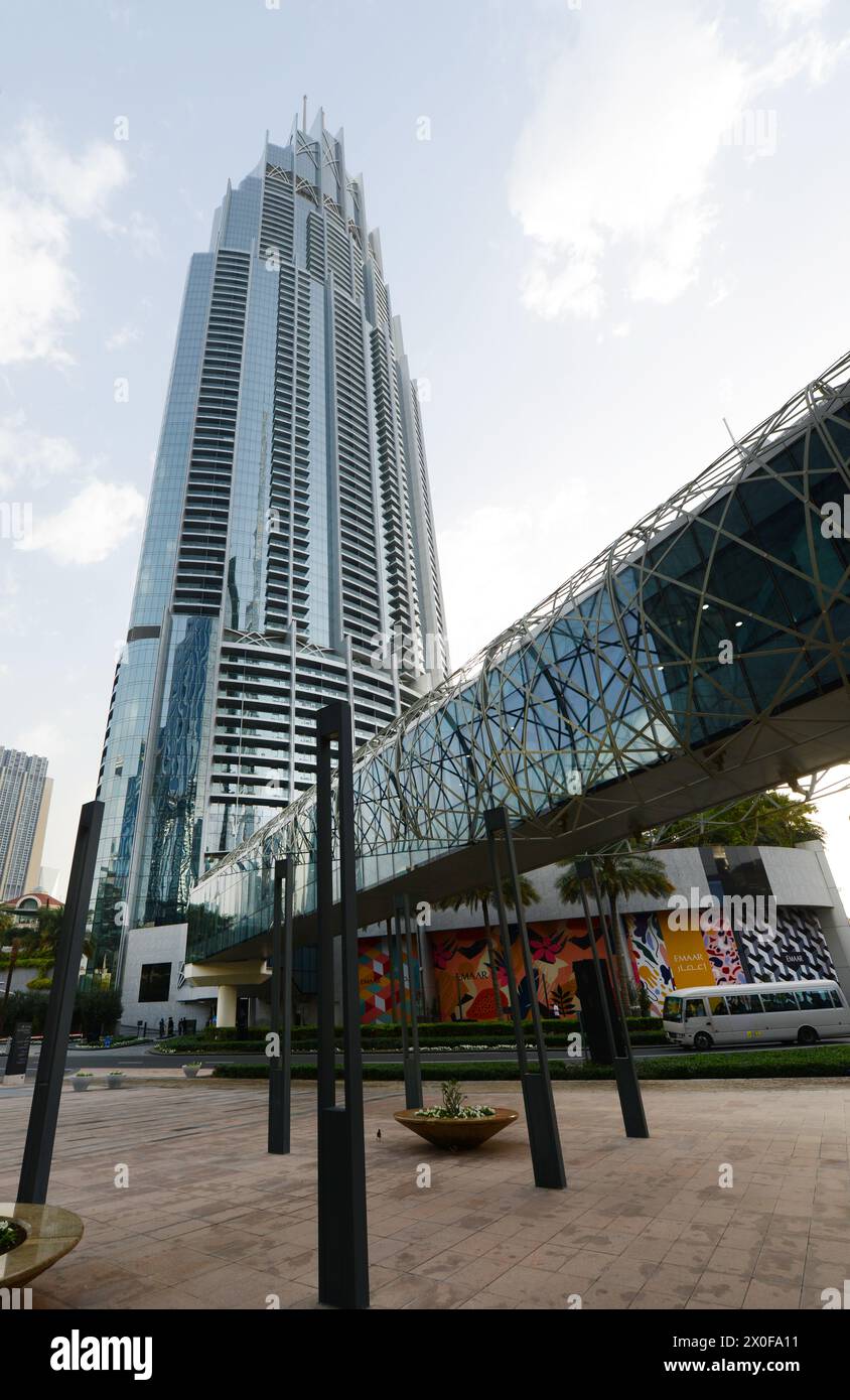 A modern pedestrian bridge and The Boulevard tower in downtown Dubai ...