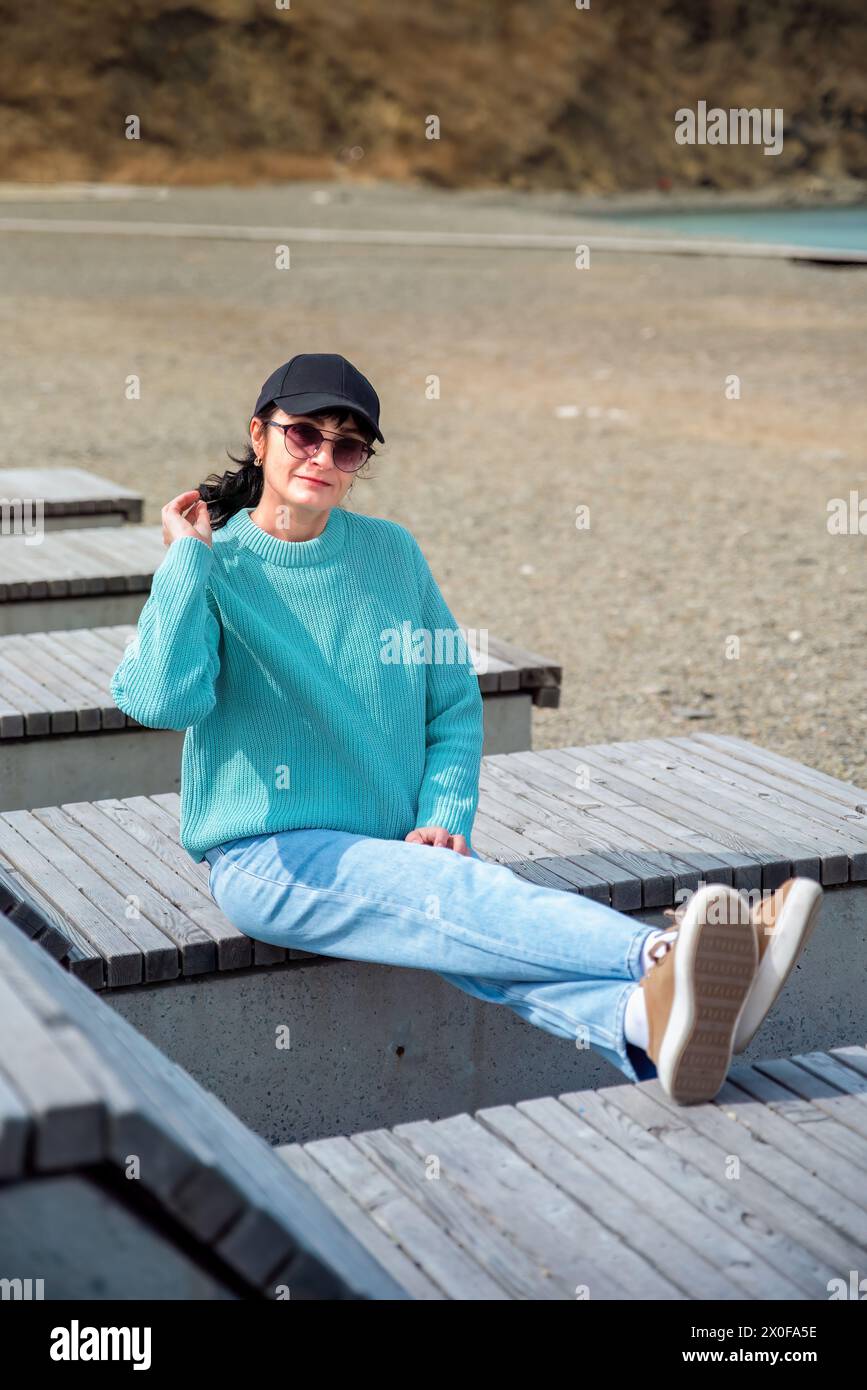 49 year old Russian woman smiling, looking at the camera on an early ...