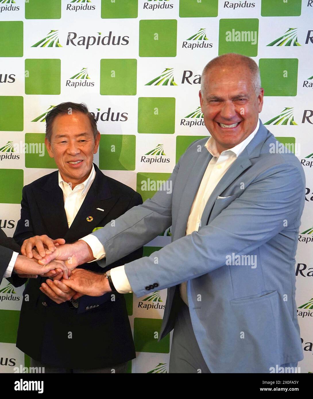 Atsuyoshi Koike, (L), President and Representative Director of Rapidus, a Japanese semiconductor ...