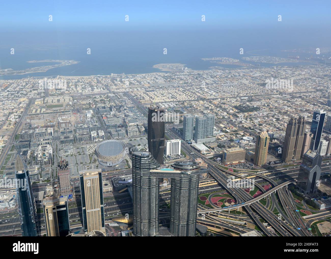 A view of the Twin Address Sky View hotel and a new skyscraper being ...