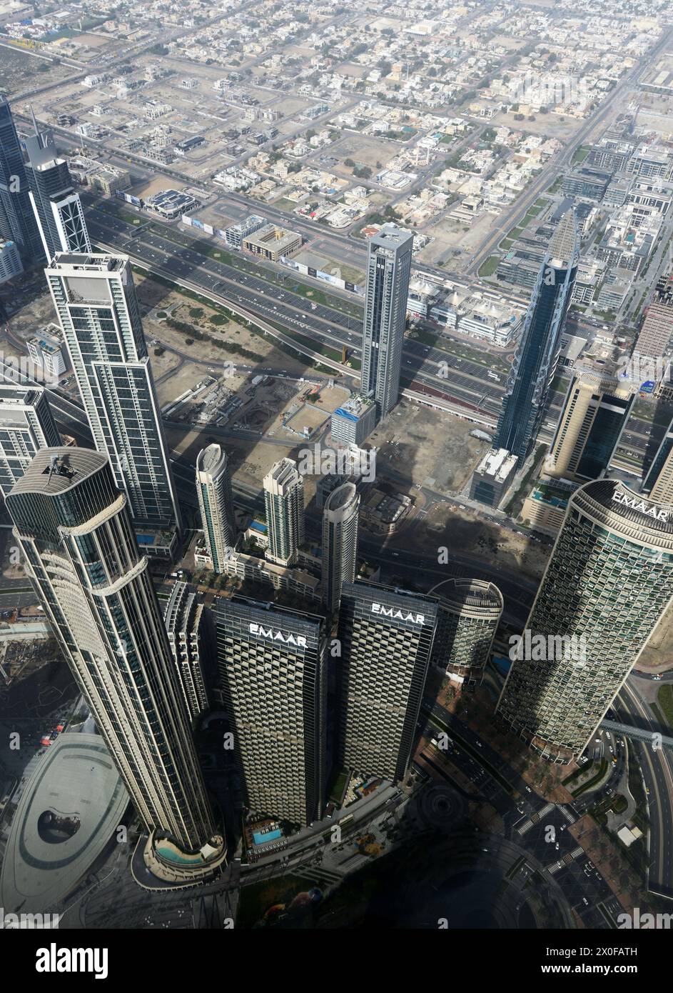 Aerial view of the Dubai opera and the towers surrounding it in ...