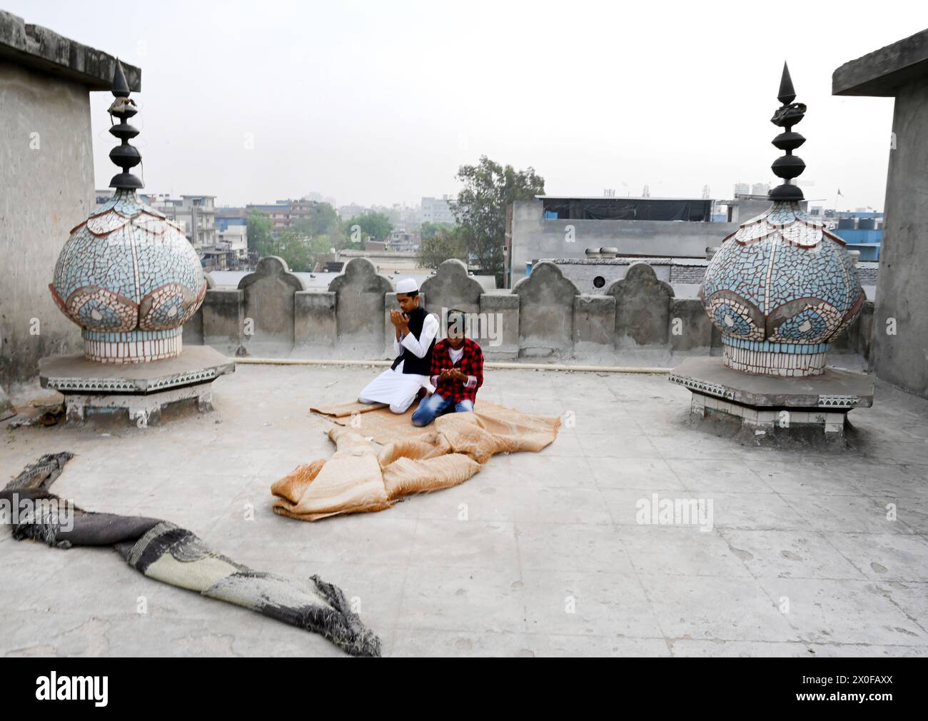 NOIDA, INDIA - APRIL 11: Muslims offer prayers (namaz) on the occasion ...