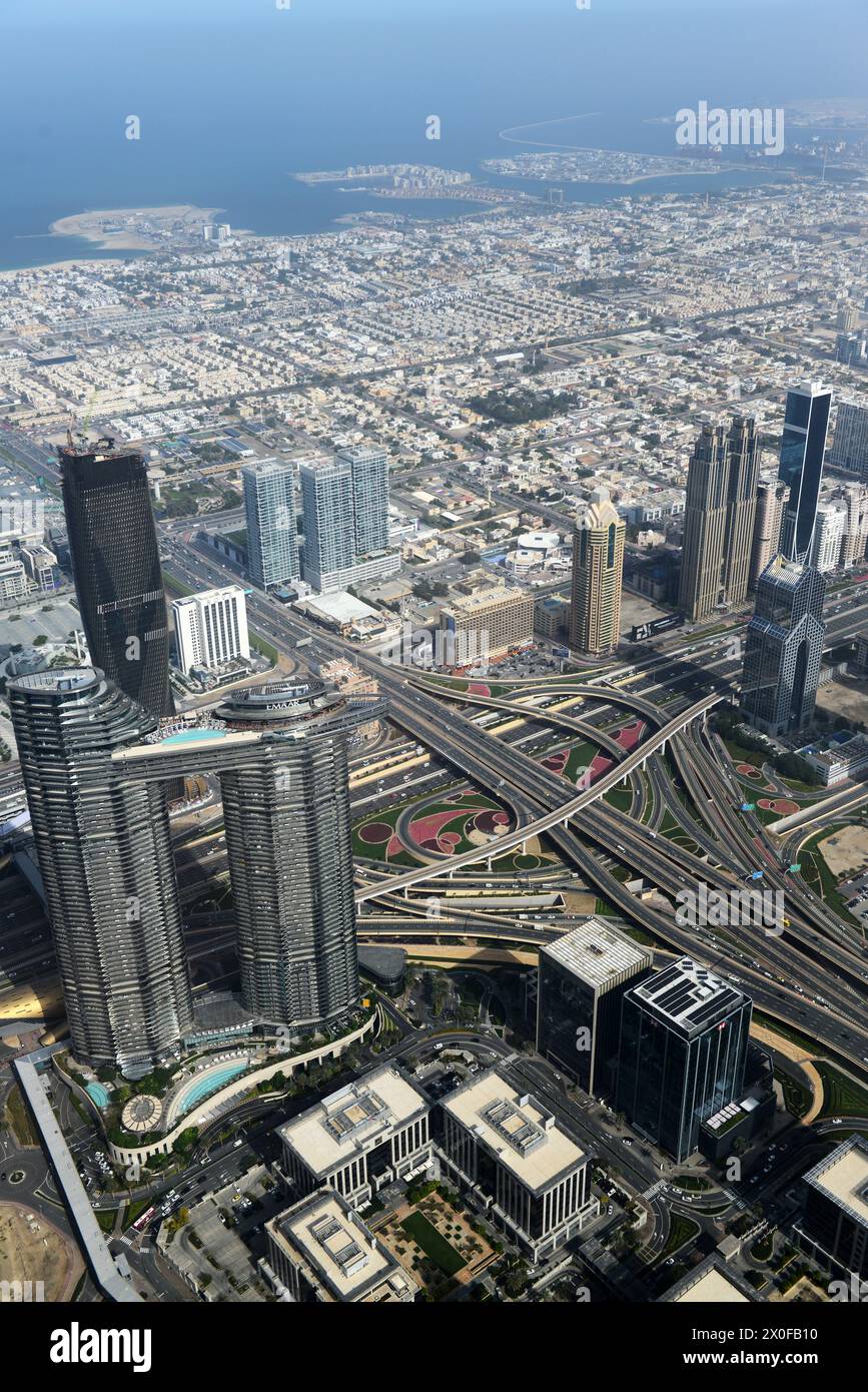 A view of the Twin Address Sky View hotel and a new skyscraper being ...