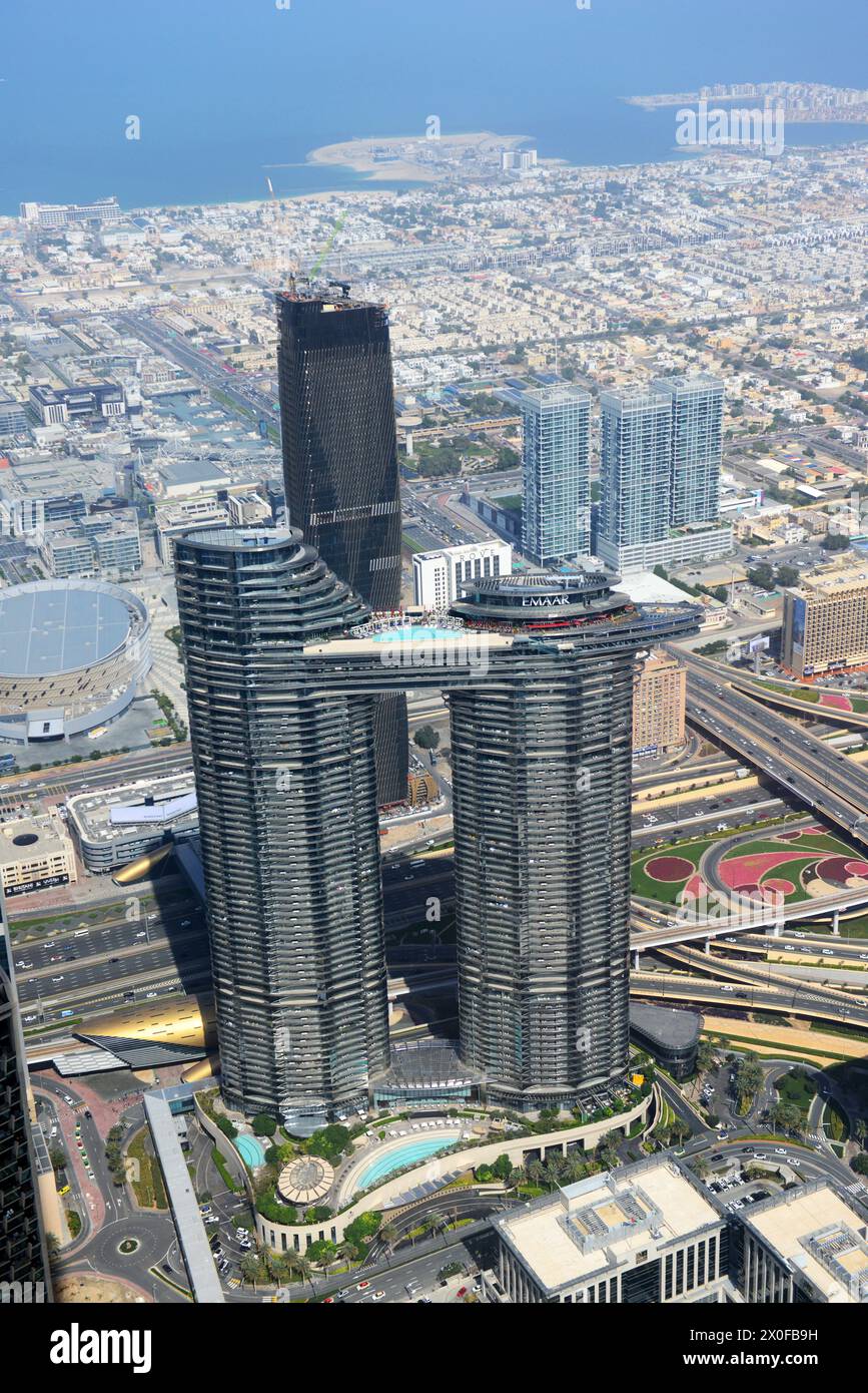 A view of the Twin Address Sky View hotel and a new skyscraper being ...