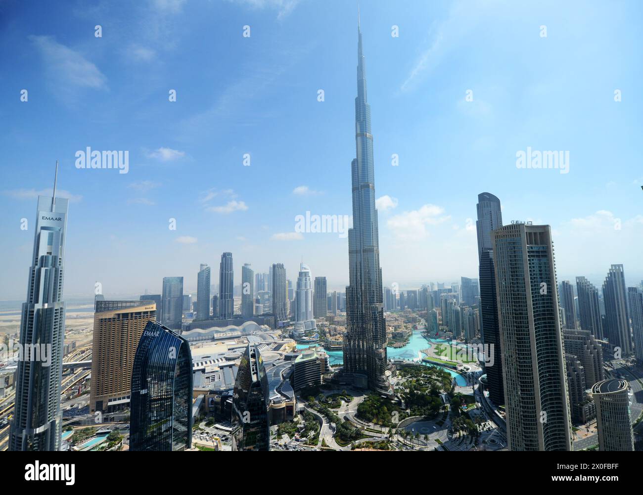 The Burj Khalifa tower with the Dubai Mall and other skyscrapers around ...