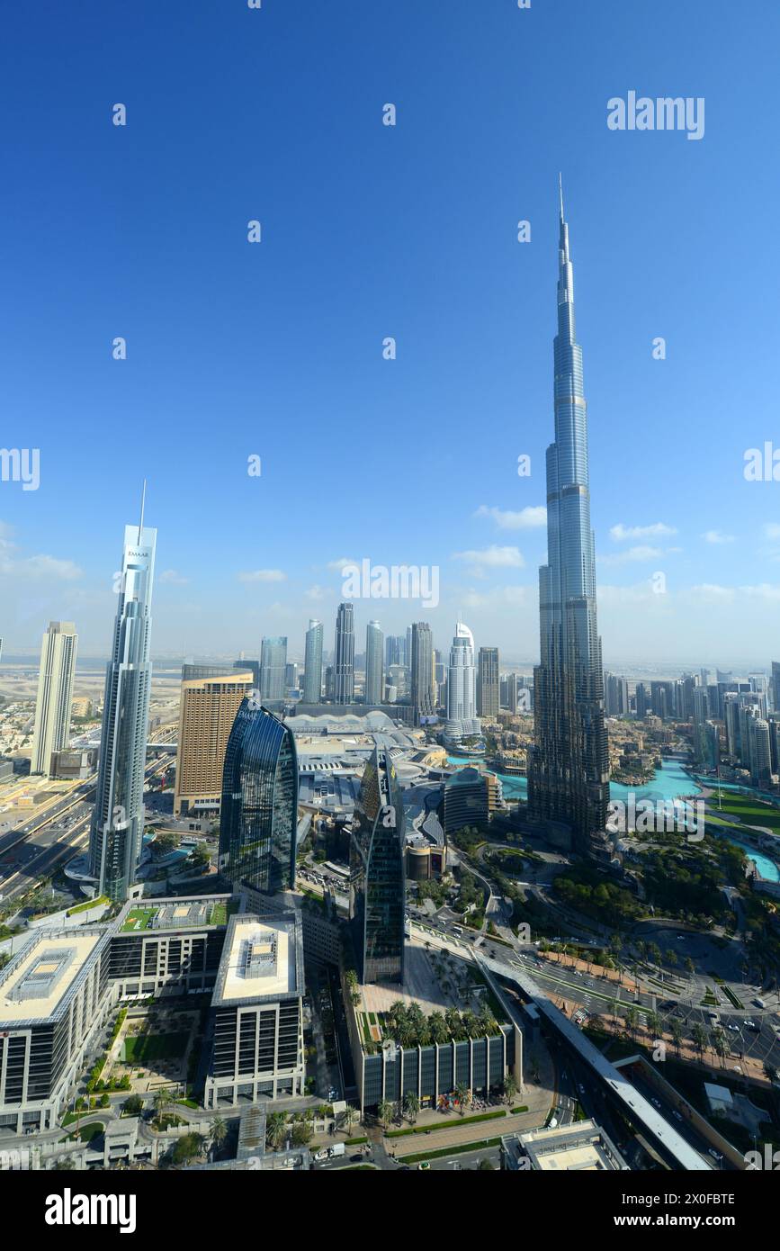 The Burj Khalifa tower with the Dubai Mall and other skyscrapers around ...