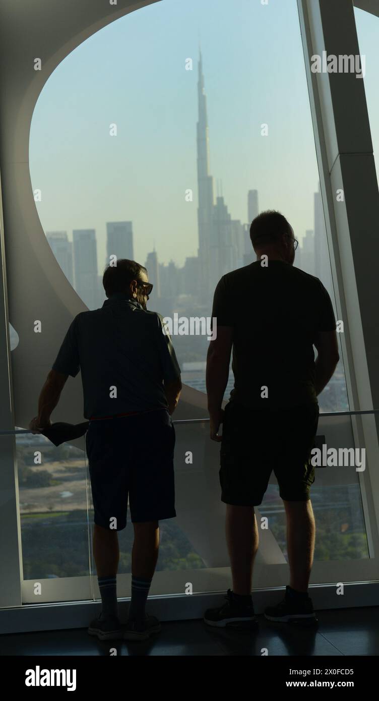 Tourist enjoying the city views from the Observatory deck at the top of ...
