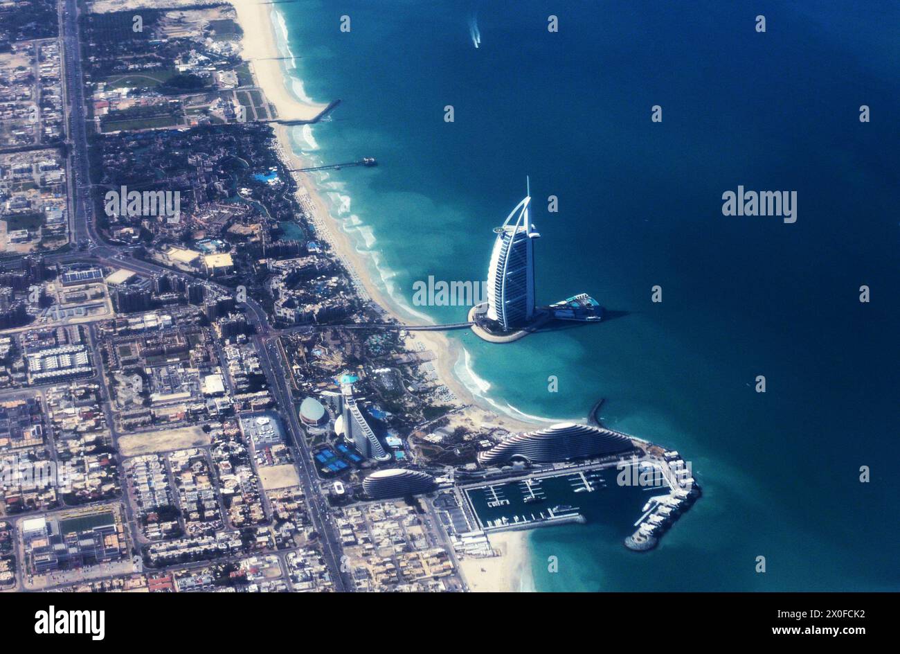 An Aerial view of Dubai's coastline with the Burj Al Arab hotel. Dubai ...