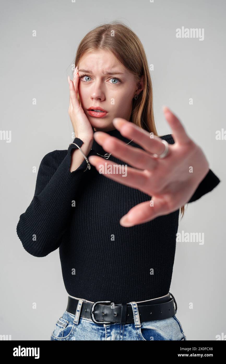 Young Woman Expressing Discomfort and Disapproval With Hands Up in ...