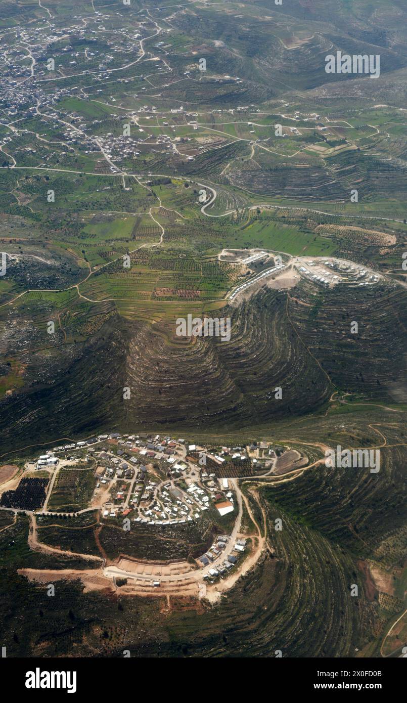 Aerial view of Israeli settlements and Palestinian villages in Judea ...