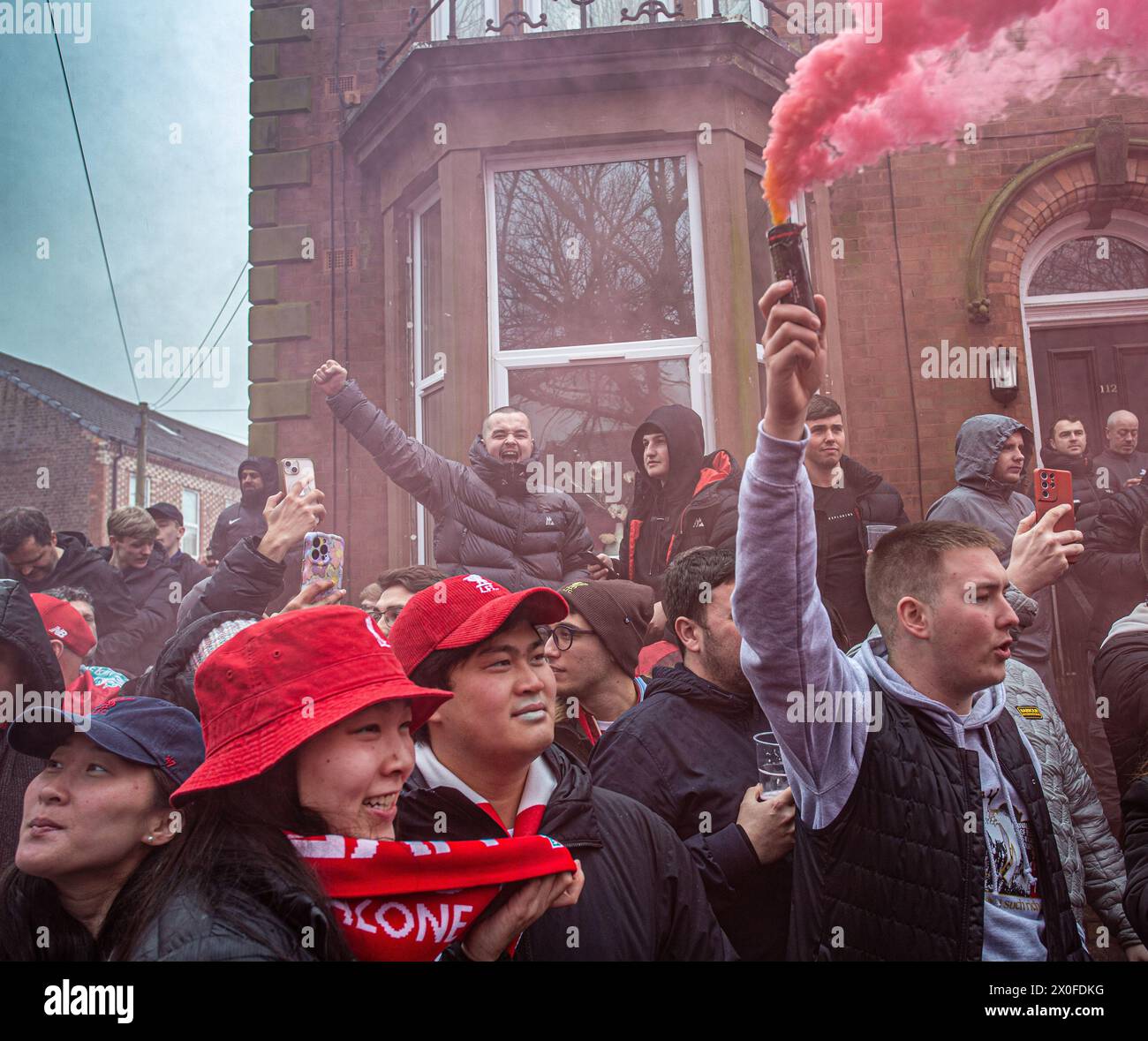 Liverpool supporters give the team coach a fantastic reception as they ...