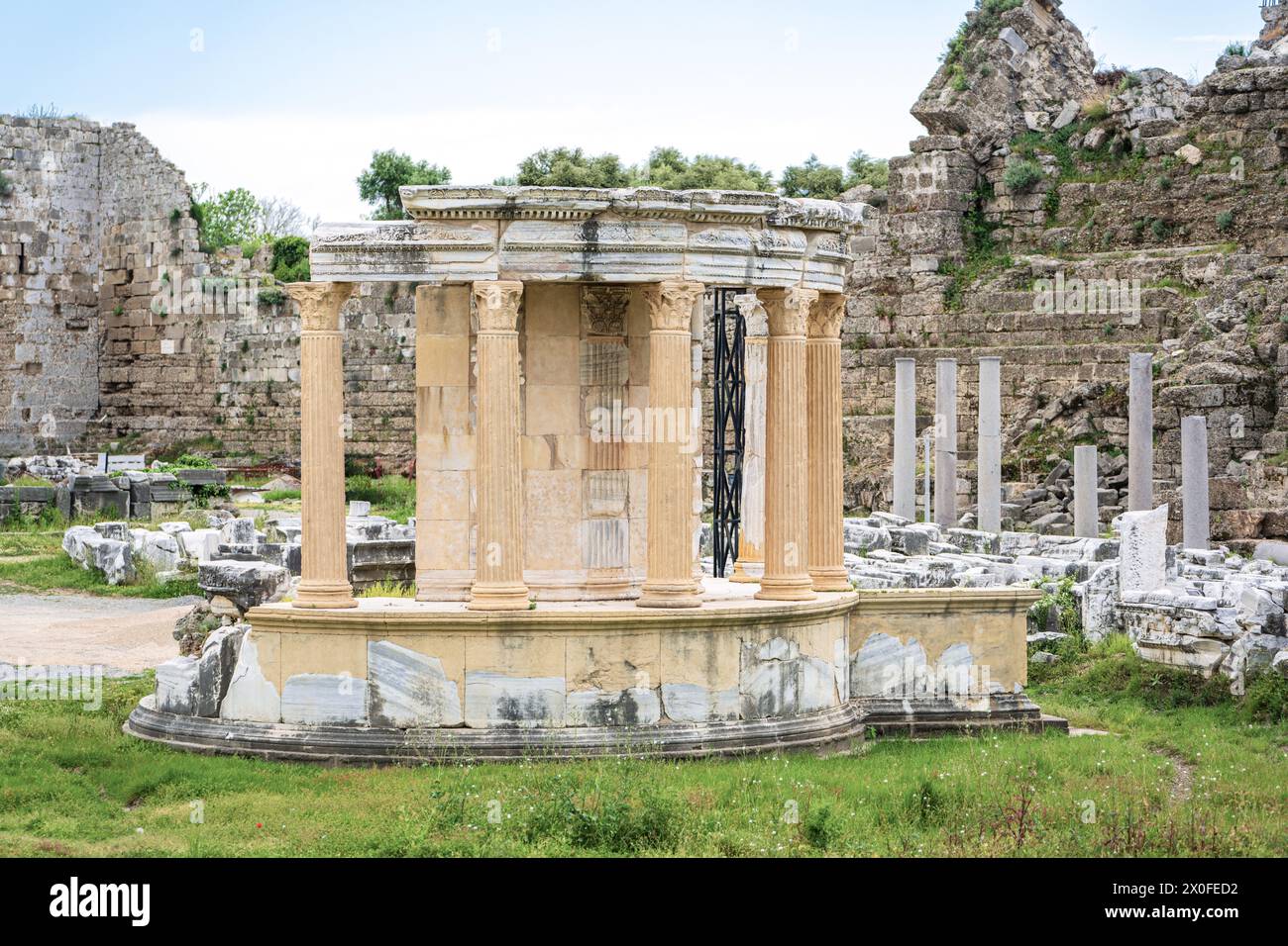 Restored ancient architectural ruins and columns of the ancient city of ...