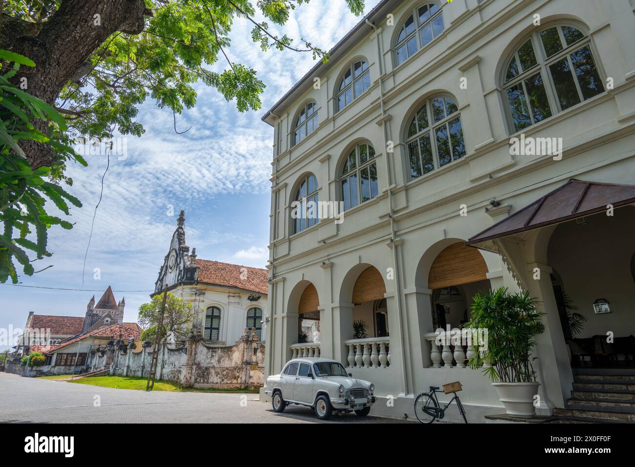 Galle Fort, Sri Lanka, building with white walls, red roof and spire ...