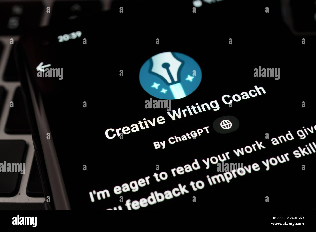 Creative Writing Coach Custom Gpt Seen In Gpt Store On The Screen Of Smartphone Placed On Laptop