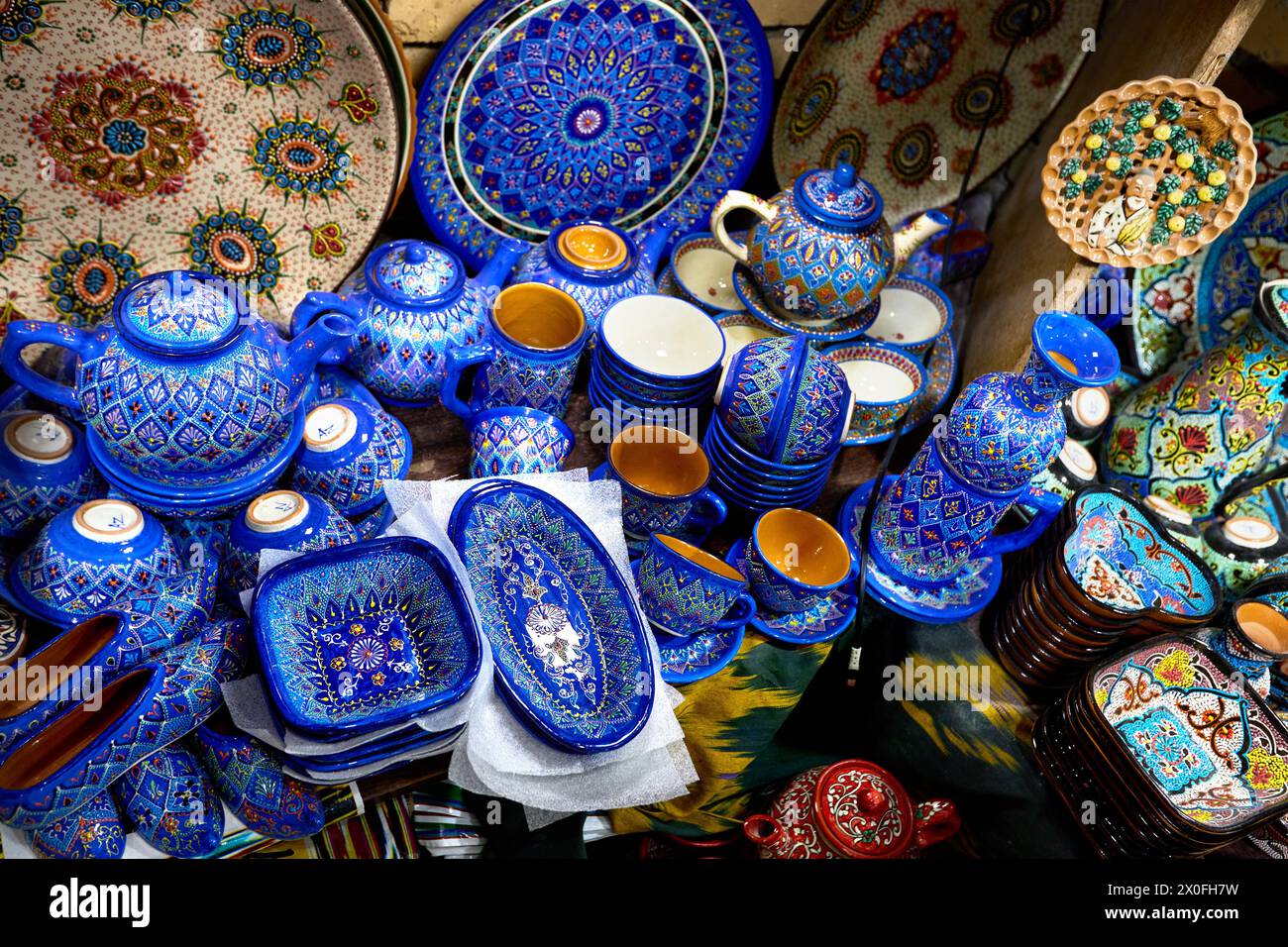 Decorative Blue ceramic plates, cups and pot with traditional ...