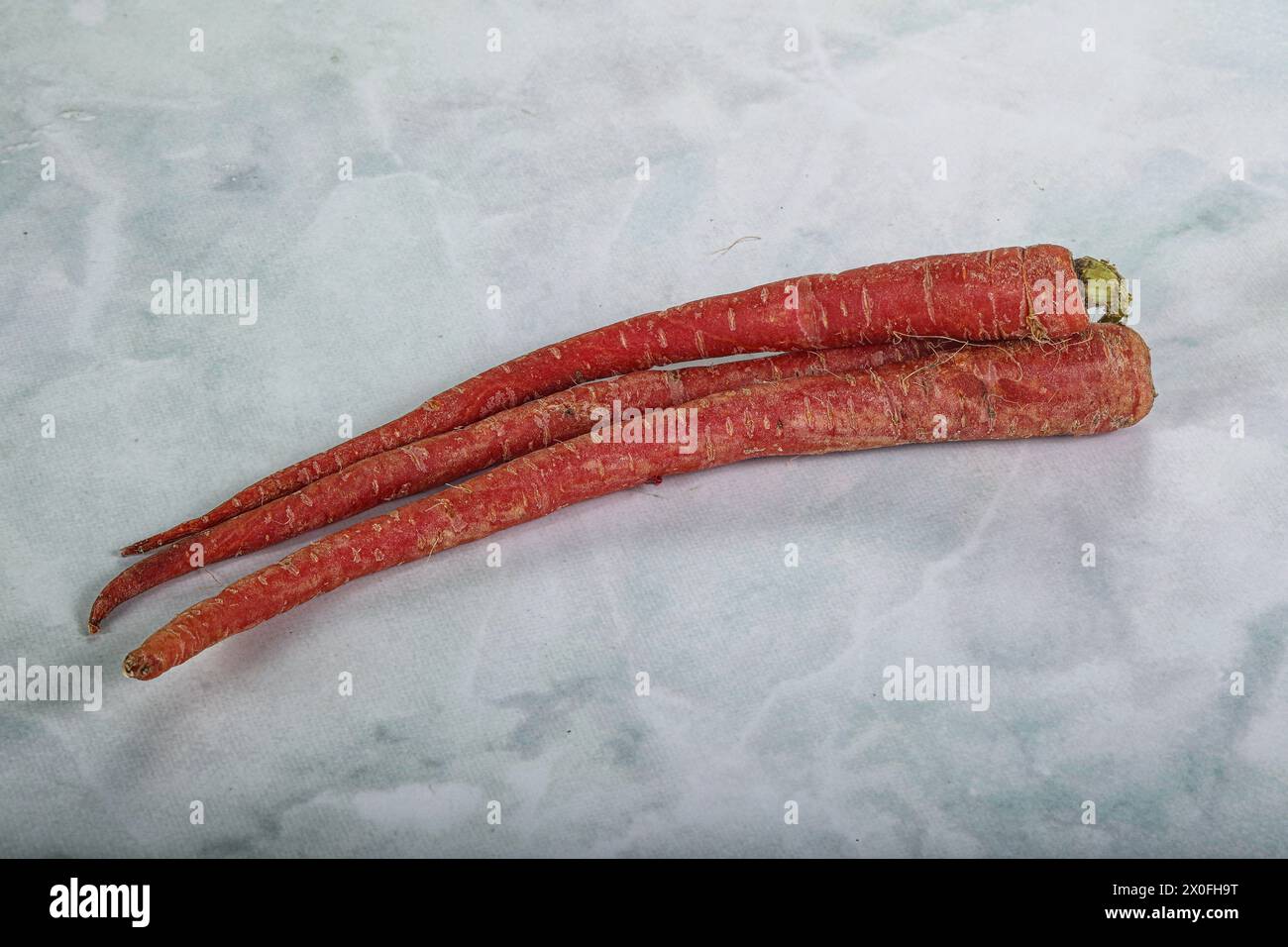 Raw ripe Indian red carrot root Stock Photo - Alamy