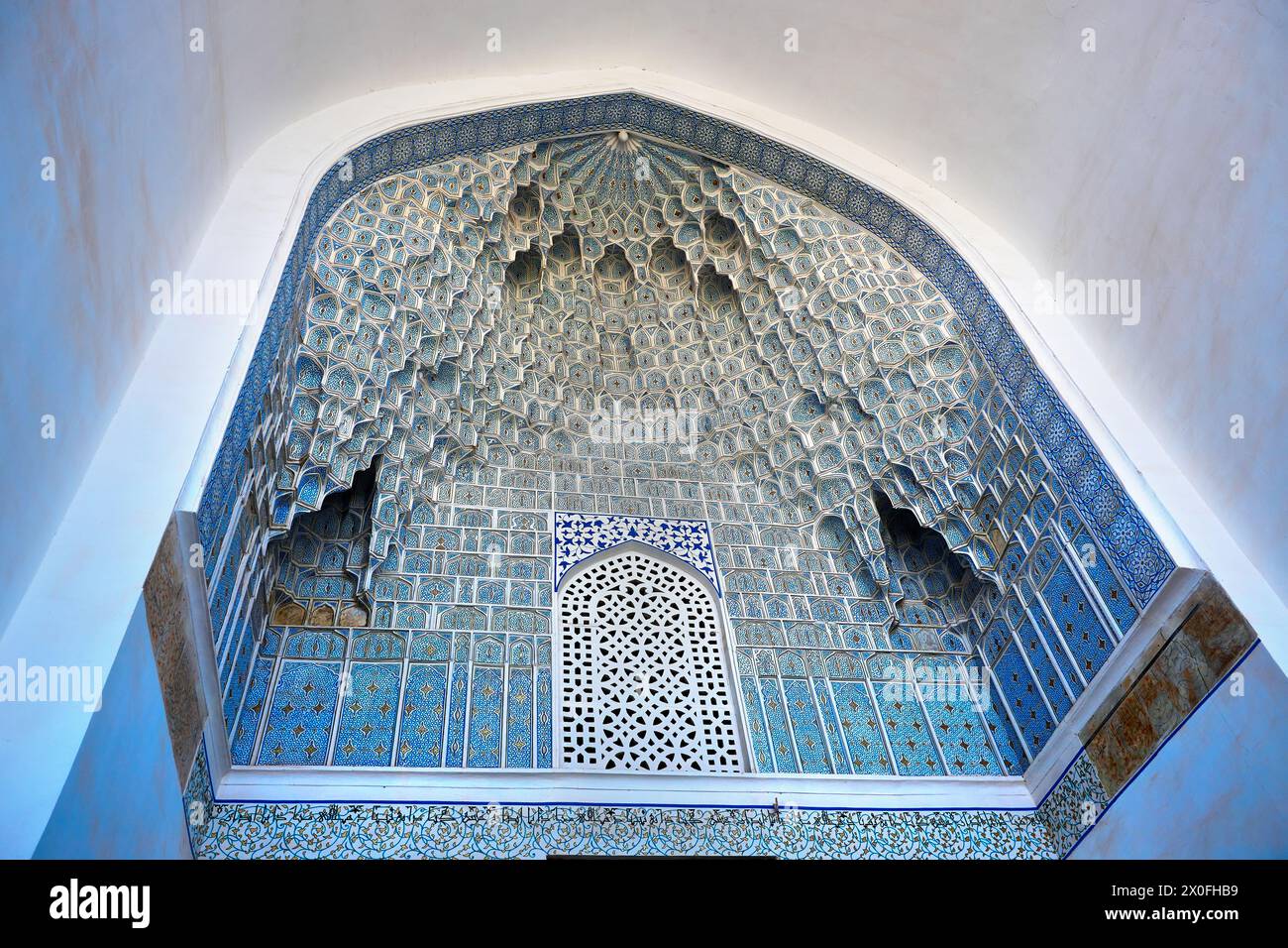 Facade of the Gur Emir mausoleum with blue mosaic brick walls in the Samarkand in Uzbekistan ...
