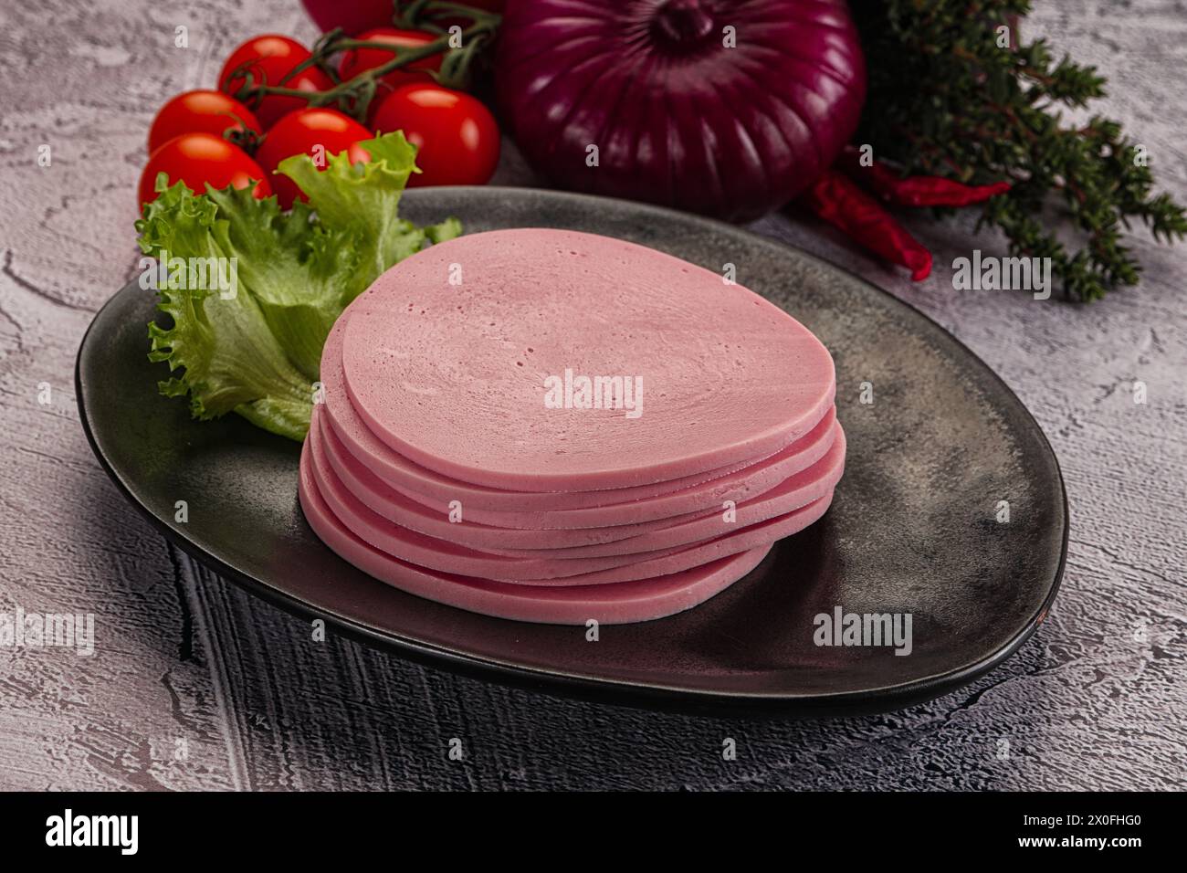 Boiled pork sliced sausage stack for breakfast Stock Photo - Alamy