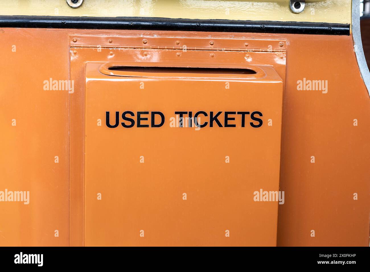 The used tickets bin on a classic English bus Stock Photo - Alamy